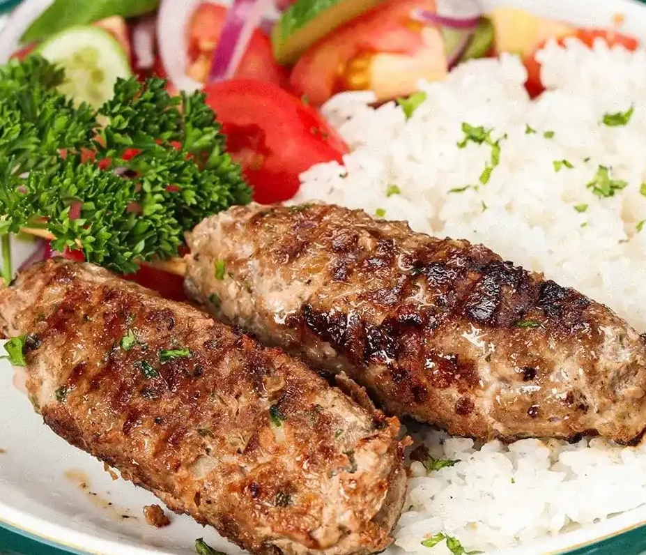 Lamb and Beef Kofta, herbed rice with lentils and Sumac roasted vegetables